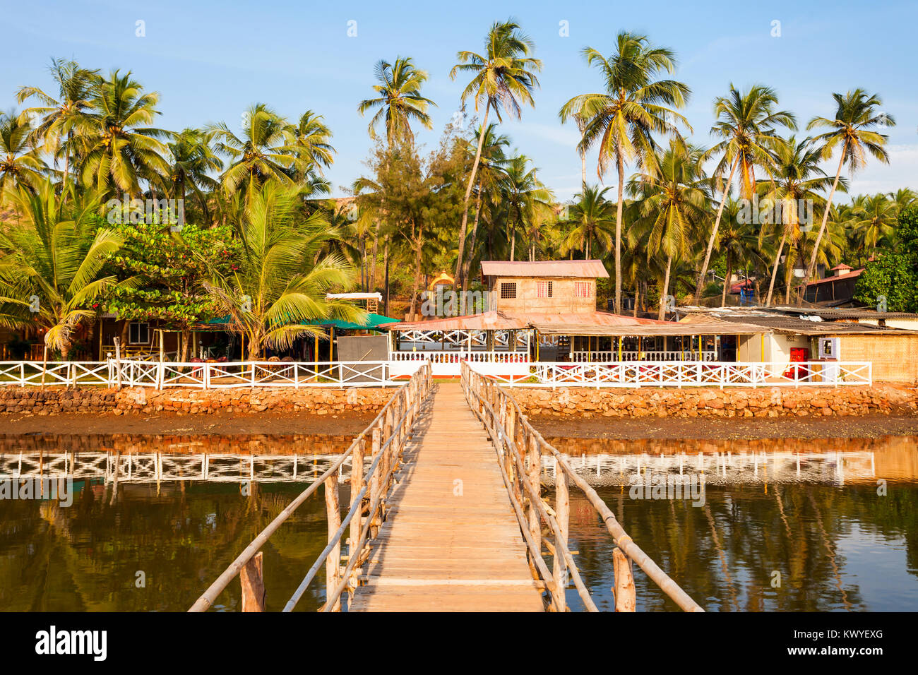 Bridge through small river on Mandrem beach in north Goa, India Stock ...