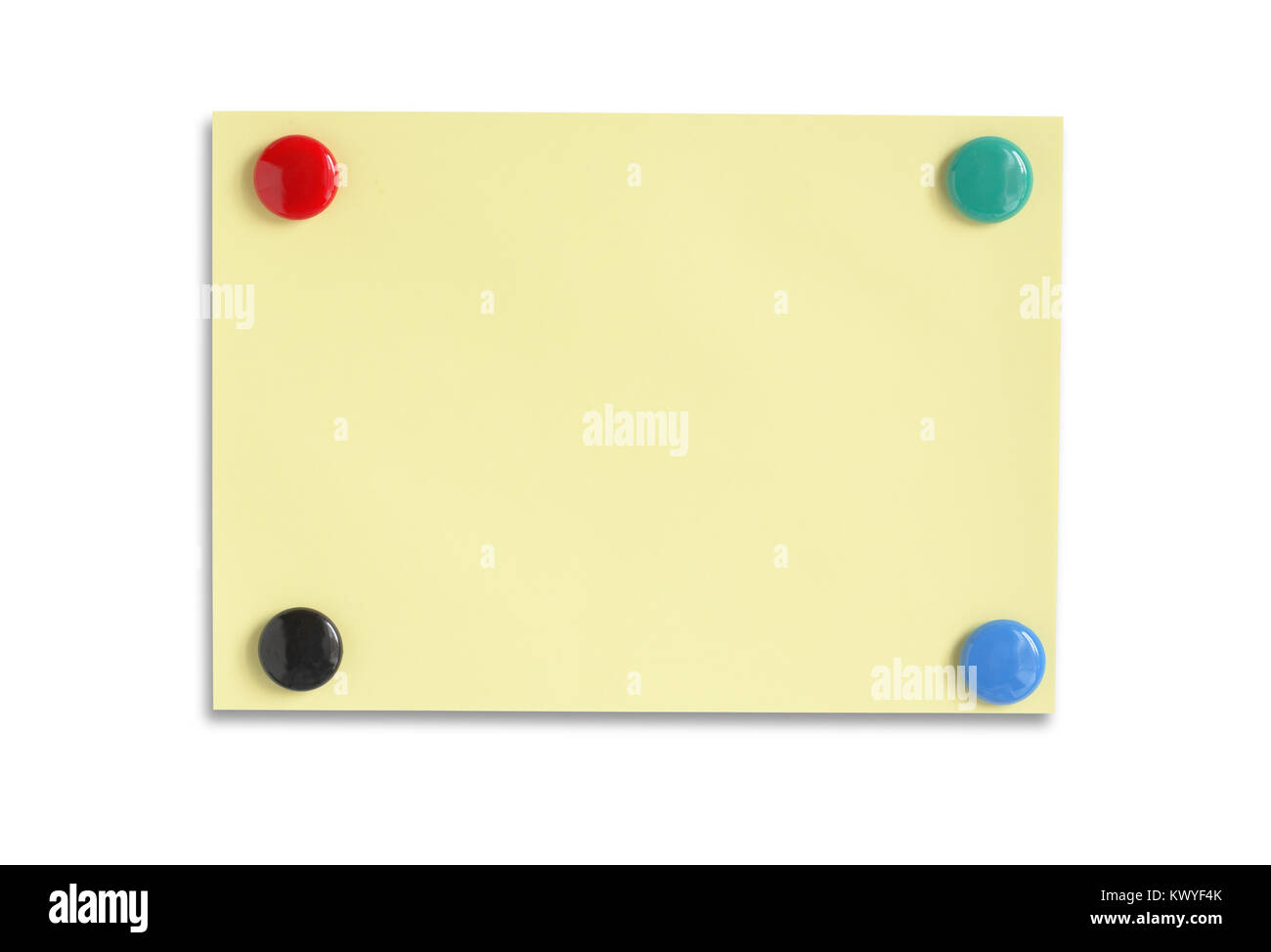 Yellow paper tablet hanging with colored magnets on white background ...