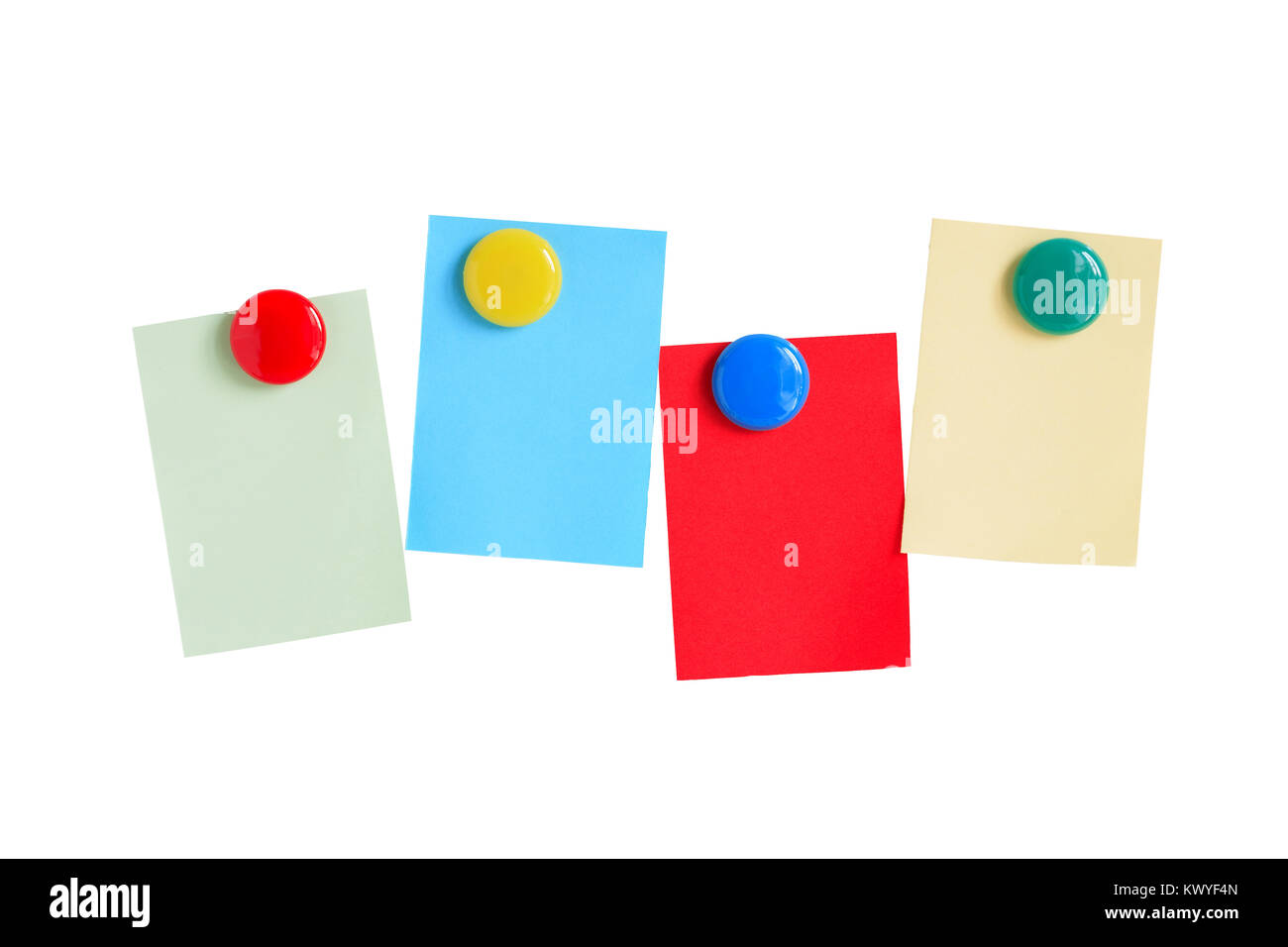 Few colored paper sheets hanging with magnets on white background ...