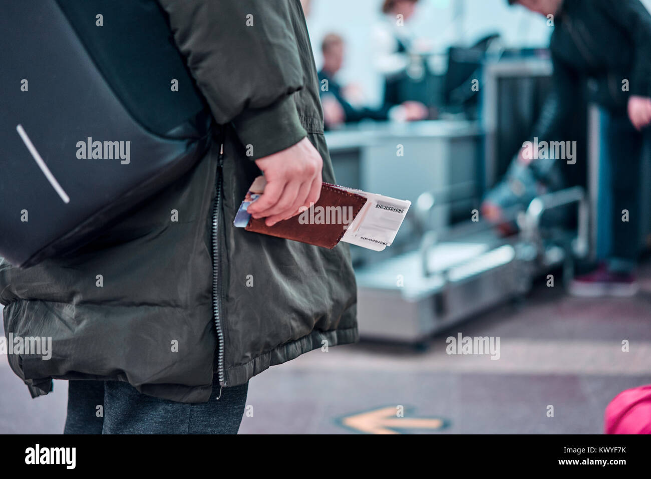 man with the tickets at the airport Stock Photo - Alamy