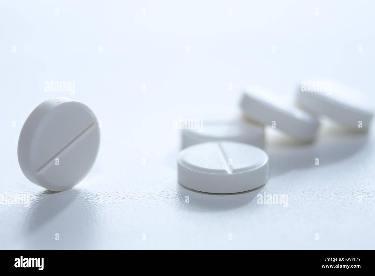 Extreme closeup of few pills on white background with copy space Stock ...