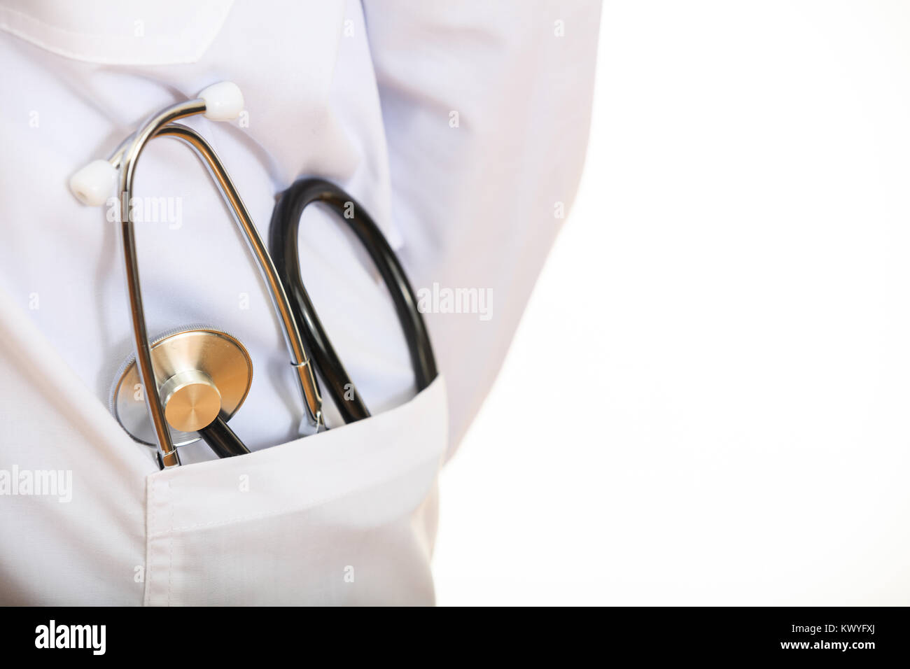 Doctor with a stethoscope standing on white background Stock Photo - Alamy
