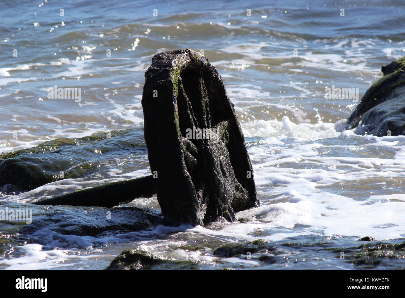 rusty and corroded wheel in water Stock Photo - Alamy