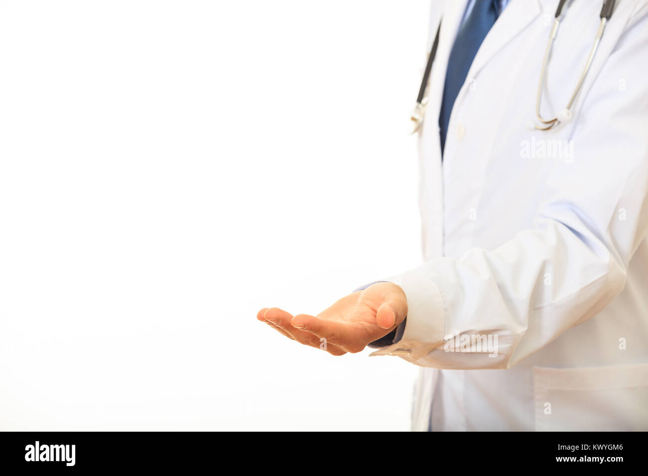 Doctor offering a hand standing on white background Stock Photo - Alamy
