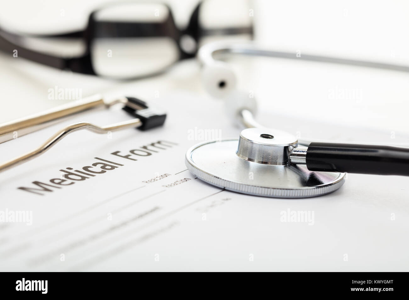 Medical form and stethoscope on white background Stock Photo - Alamy