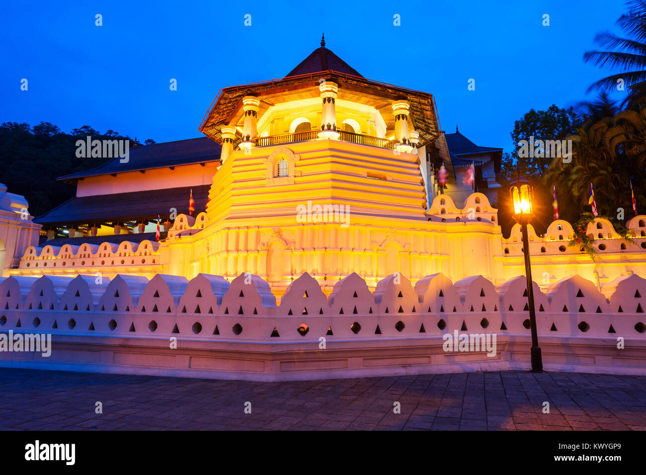Temple of the Sacred Tooth Relic or Sri Dalada Maligawa in Kandy at sunset. Sacred Tooth Relic ...