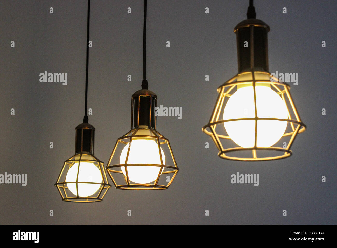 modern designer lamps hanging, interior design Stock Photo - Alamy