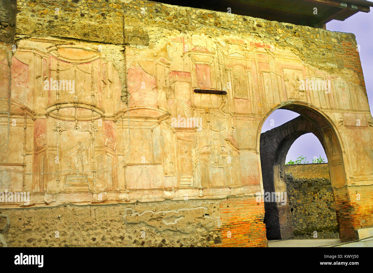 Building with decorated wall in Pompeii Stock Photo - Alamy
