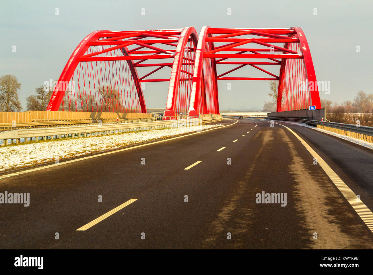 Metal frame structure of a bridge over a highway road Stock Photo - Alamy