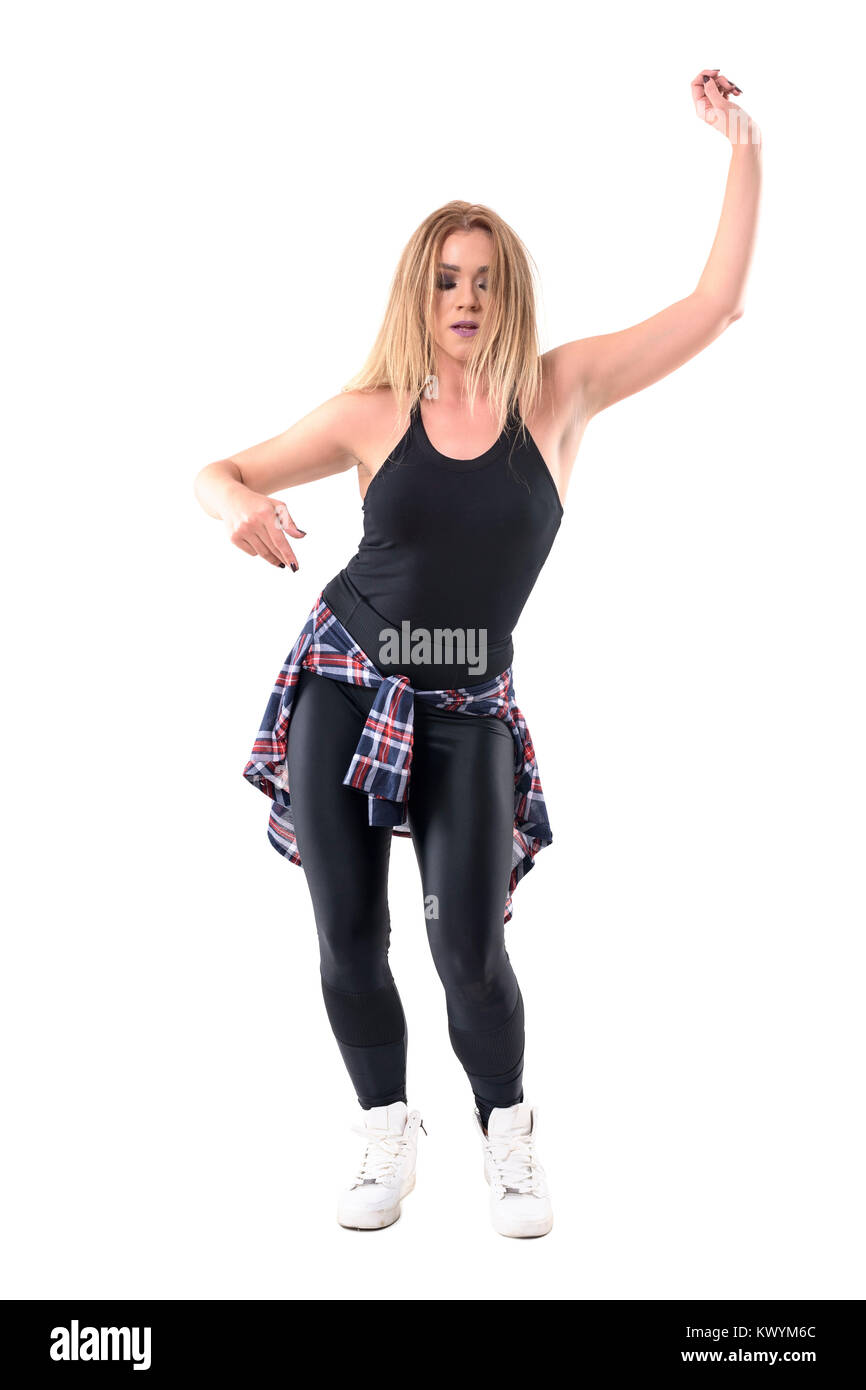 Passionate female jazz dance aerobics instructor dancing with arms ...