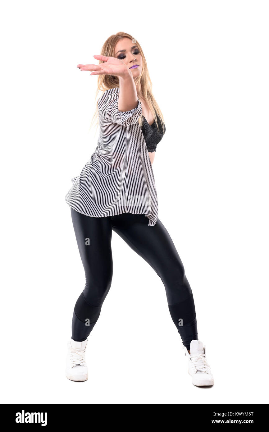 Elegant female jazz dancer dancing passionately with close eyes. Full ...