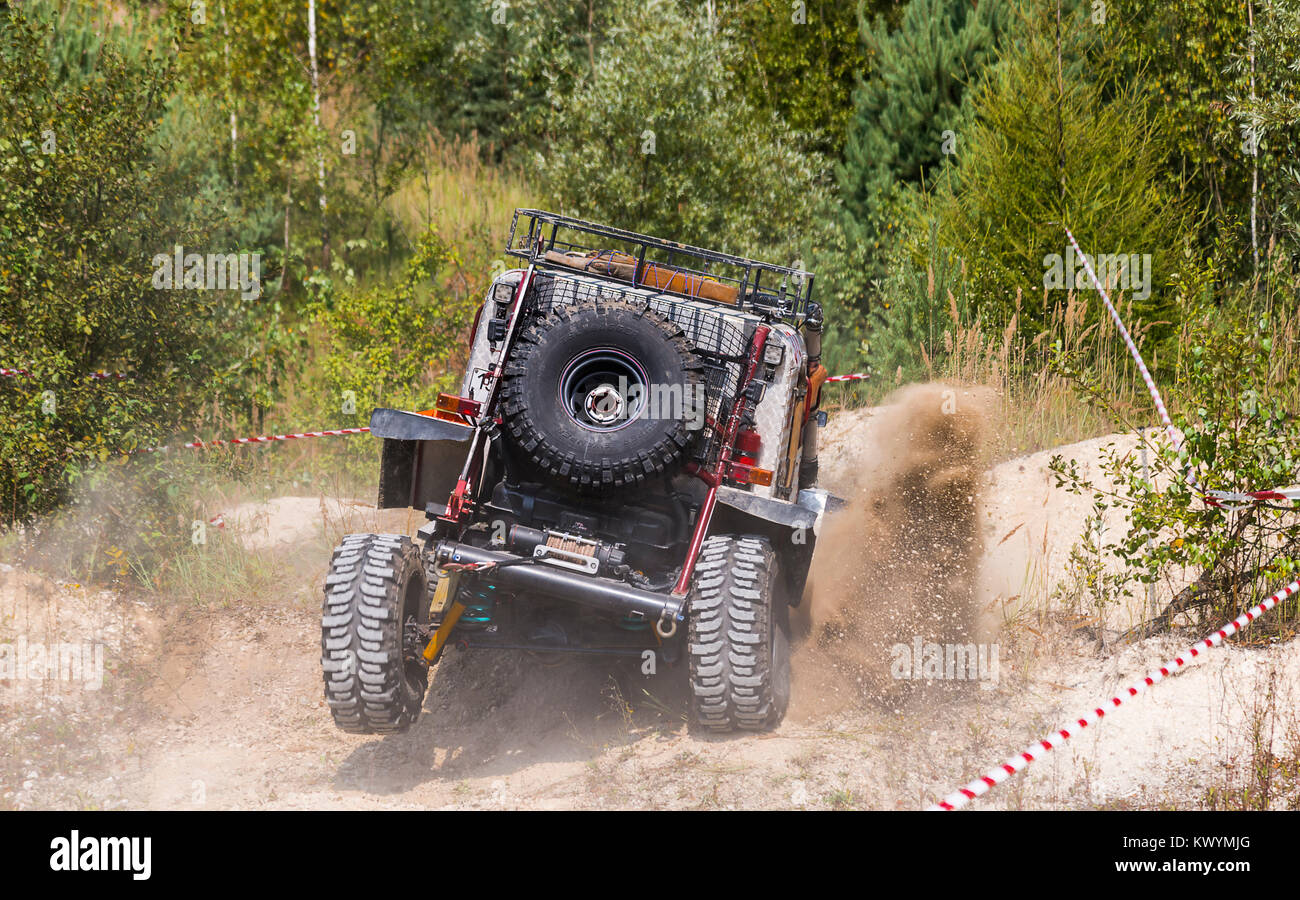 lLviv, Ukraine - August 23, 2015: Upgraded off-road vehicle overcomes ...