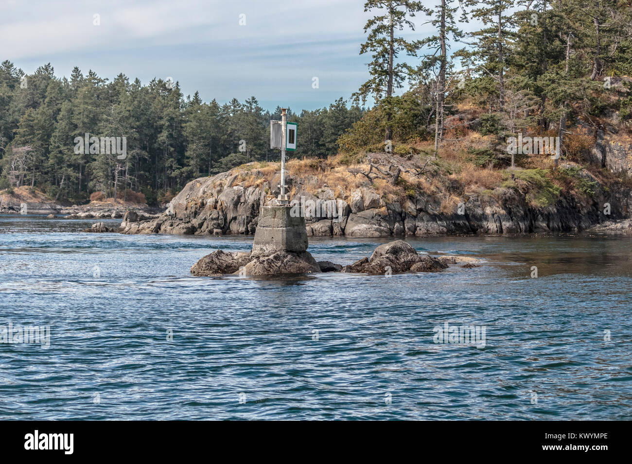 In this narrow channel with strong currents, a port-hand day beacon ...