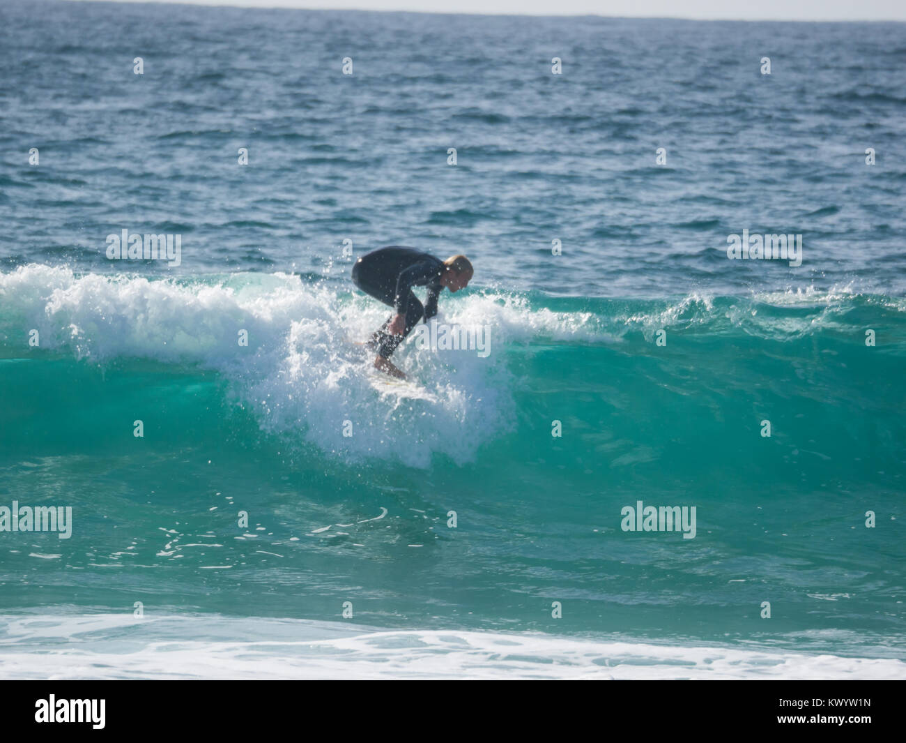 Big wave surfers hi-res stock photography and images - Alamy
