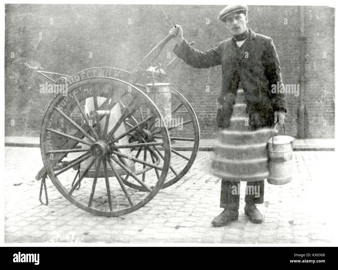 This photograph from around 1920 shows a milk cart in Peckham ...