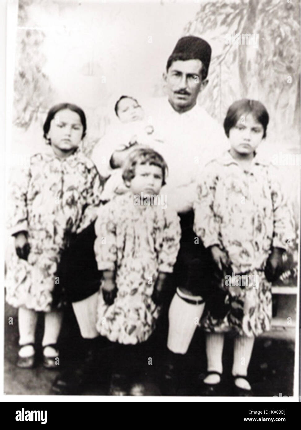 This photograph from 1929 shows Mustafa Halil and his children in front ...