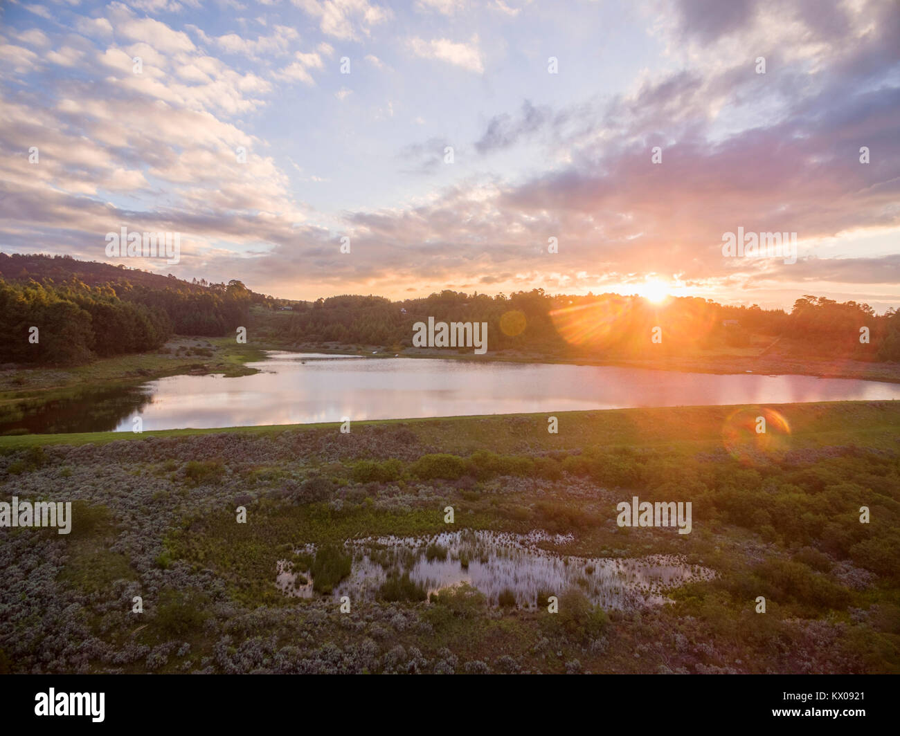 An aerial view of a dramatic sunset of Loch Maree, Connemara Lakes ...