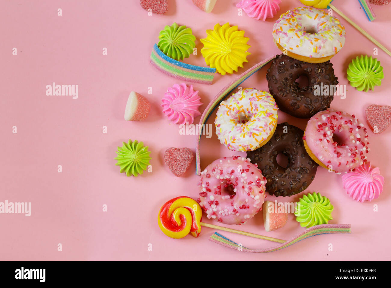 sweet donuts with sugar and chocolate colored glaze Stock Photo - Alamy