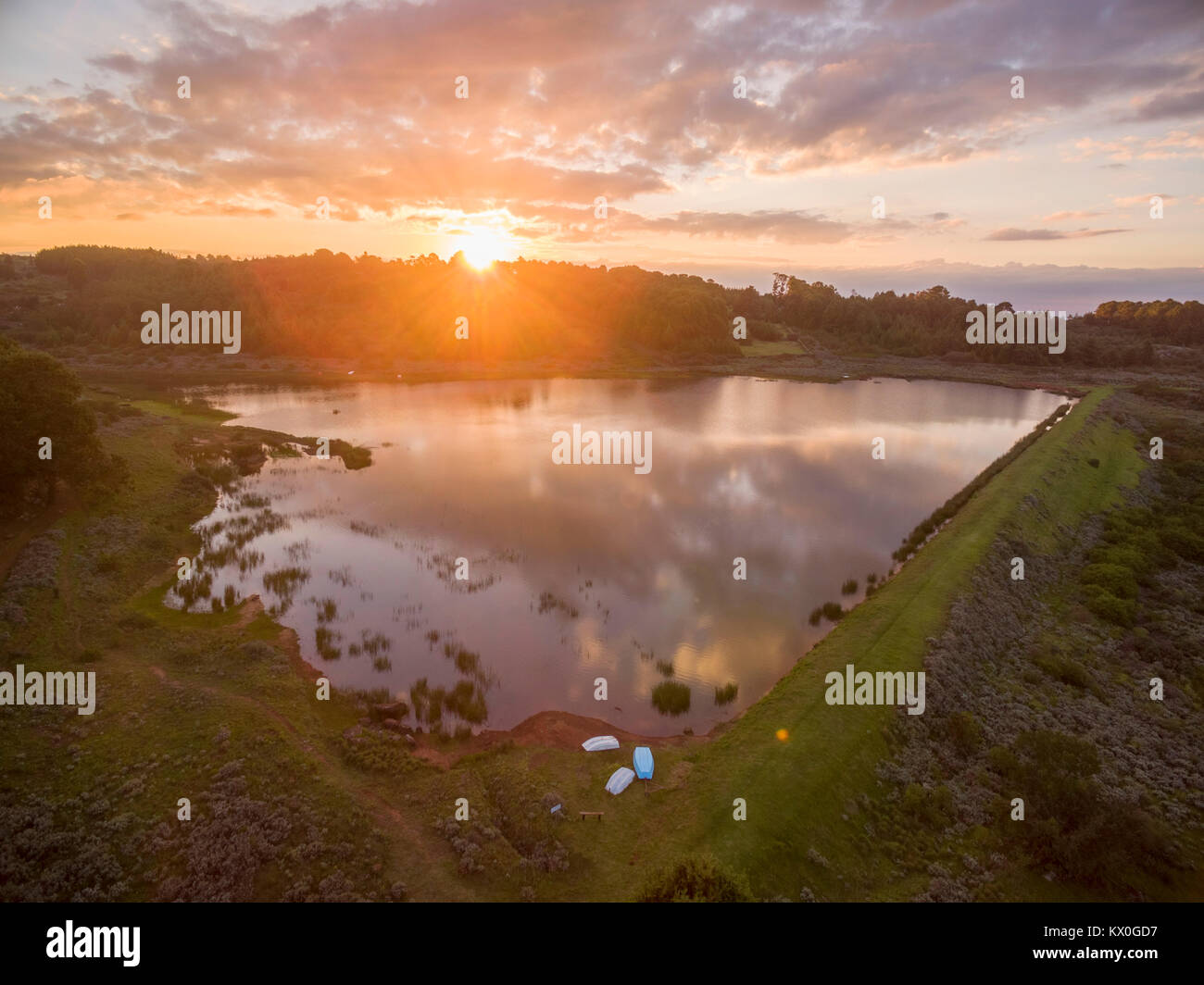 An aerial view of a dramatic sunset of Loch Maree, Connemara Lakes ...