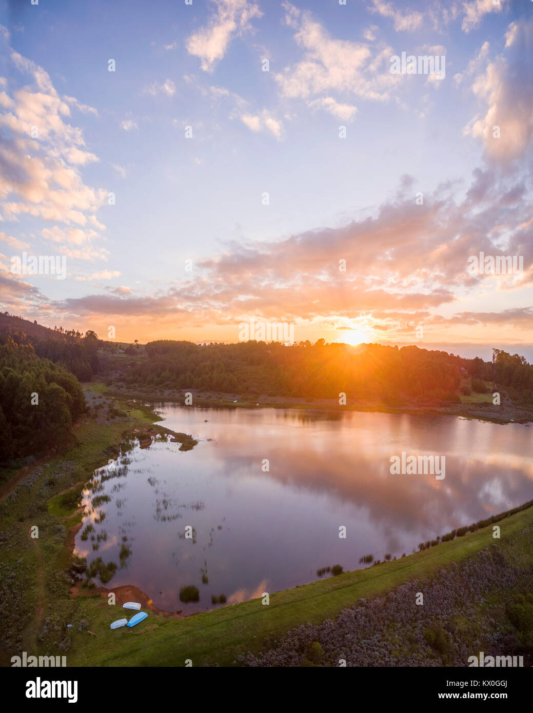An aerial view of a dramatic sunset of Loch Maree, Connemara Lakes ...