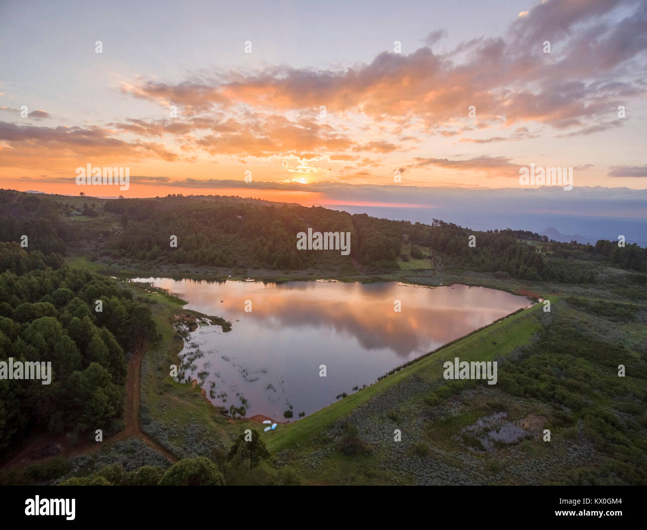 An aerial view of a dramatic sunset of Loch Maree, Connemara Lakes ...