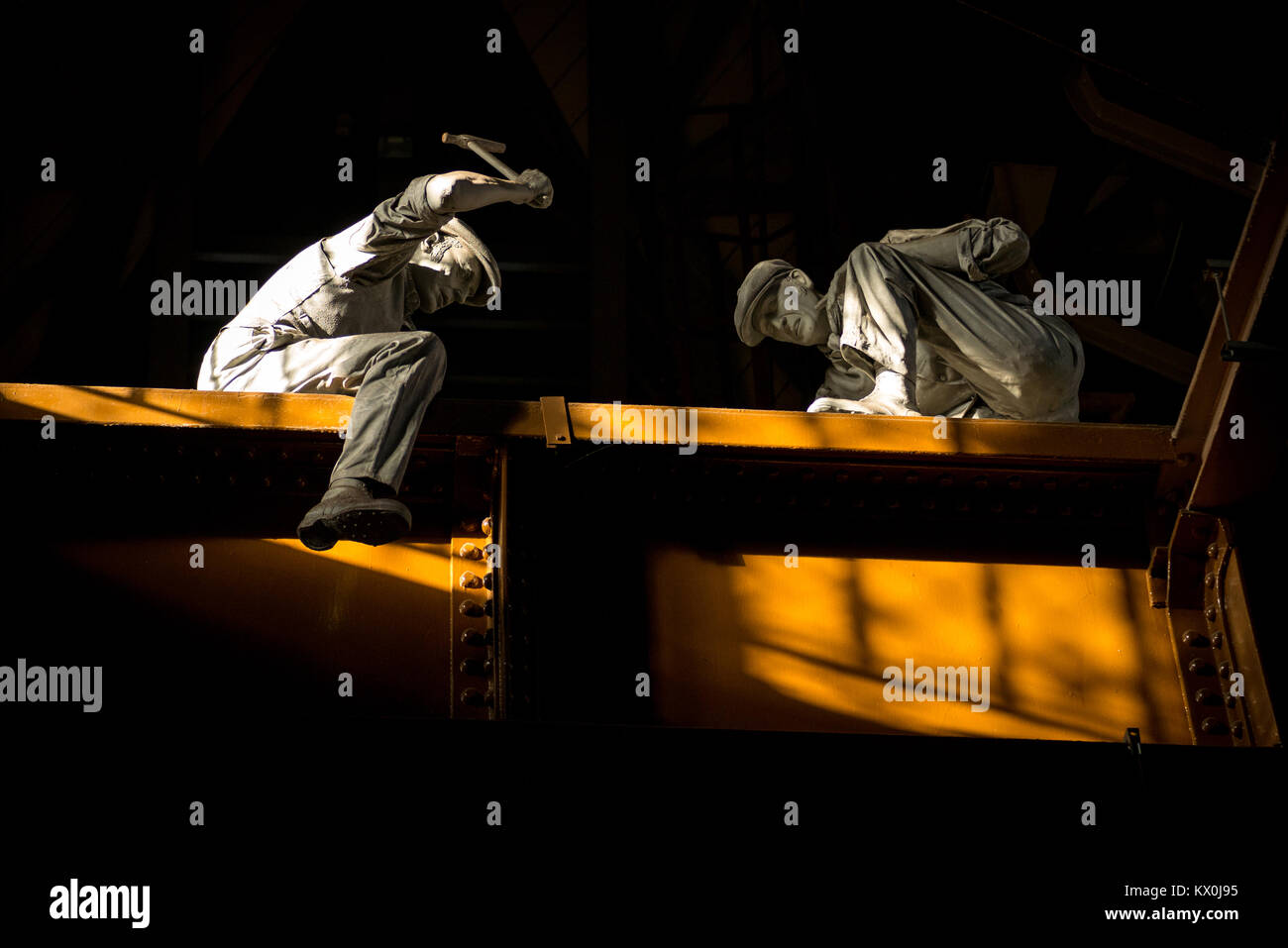 Statues of workers in Tower Bridge Stock Photo - Alamy