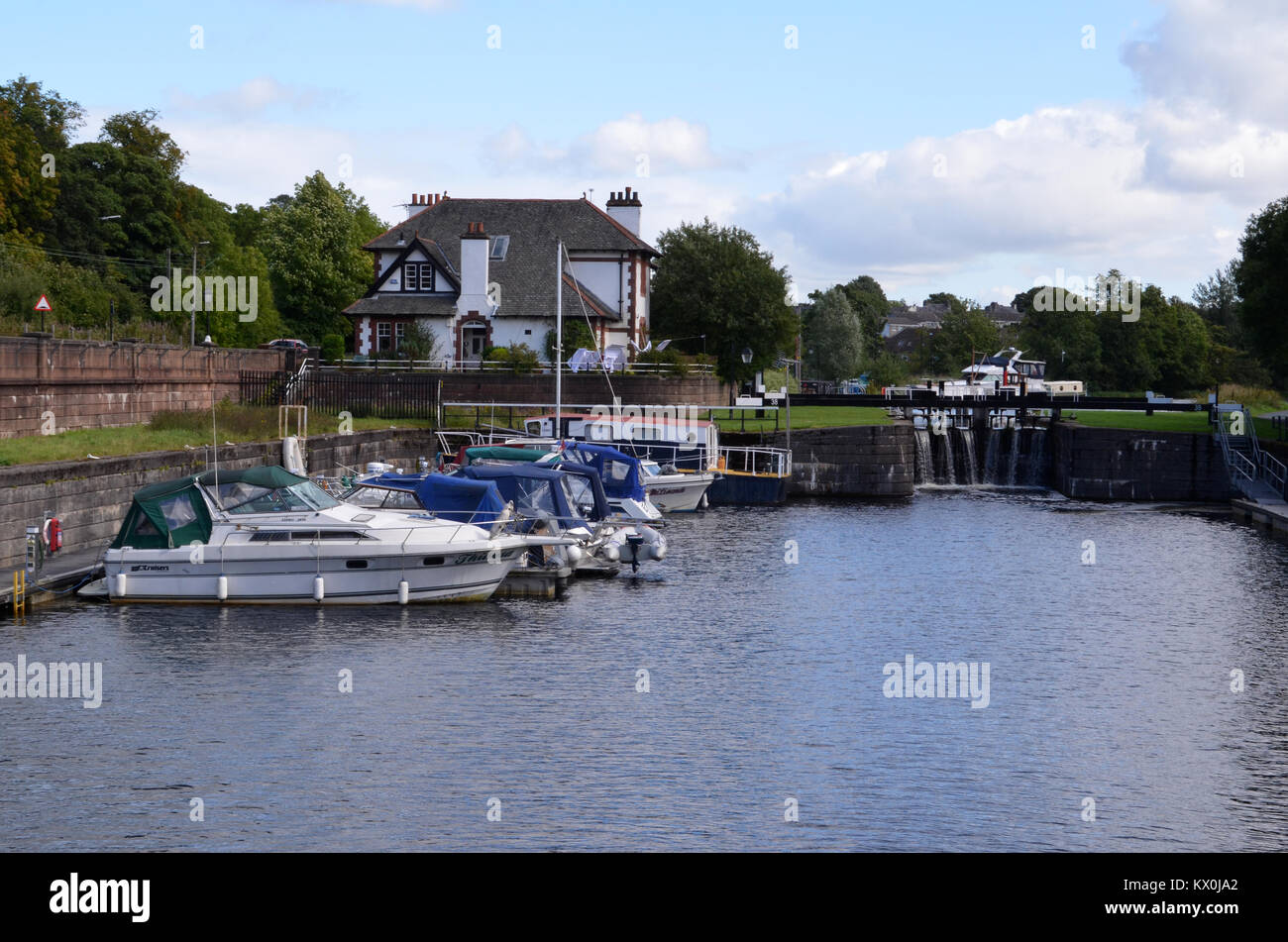 Boats moored at Bowling Harbour where the Forth and Clyde meets the ...