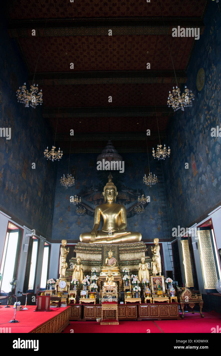 Main seated golden Buddha in Wat Rat Natda Ram Worawihan Monastery or ...