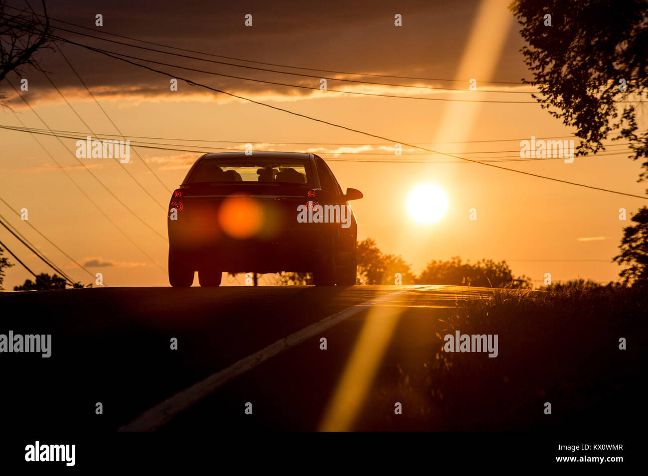 Driving into the sunset hi-res stock photography and images - Alamy