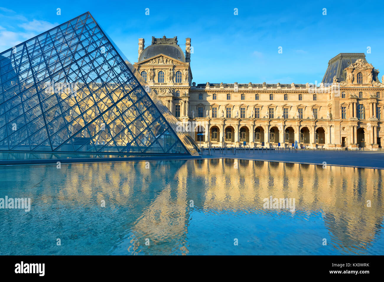 PARIS, FRANCE - MAY 2013: Louvre Museum building and Pyramid early ...
