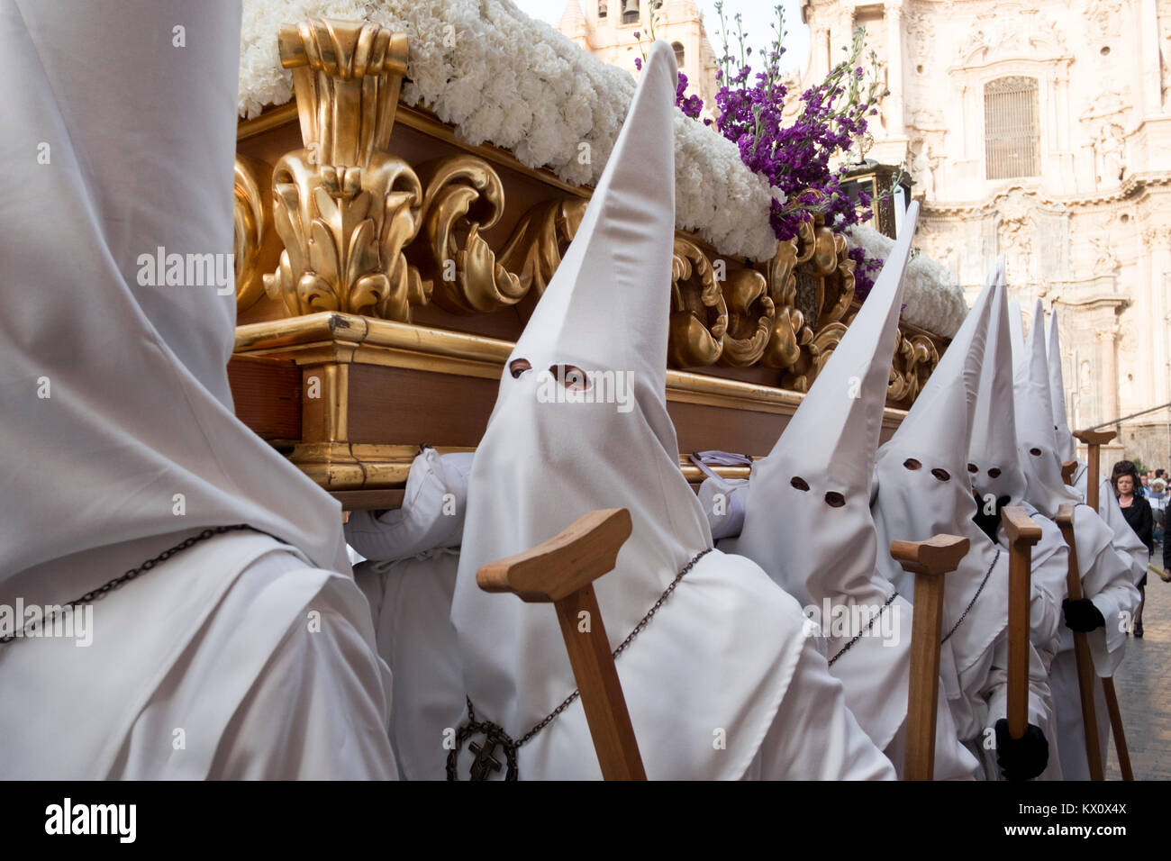 passionateDuring the Semana Santa ceremonies, penitents carry religious ...