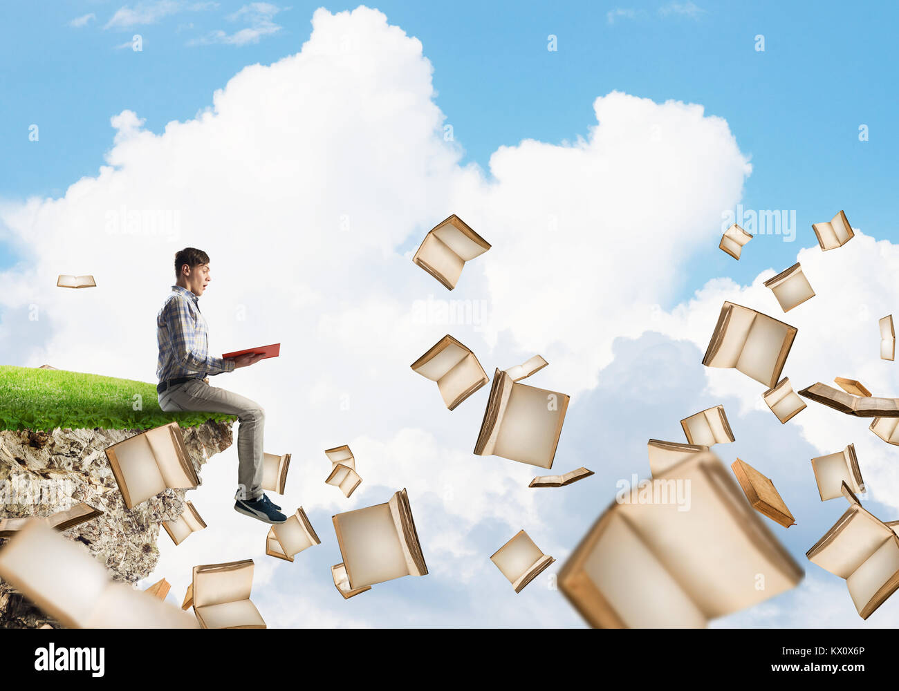 Young man floating on island in blue sky with red book in hands Stock ...