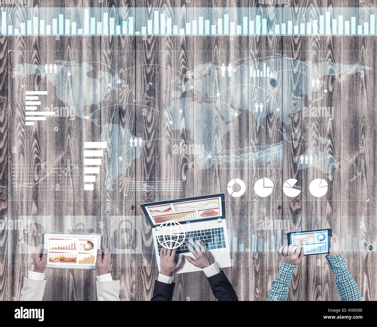 Group of three people with devices in hands working together as symbol ...