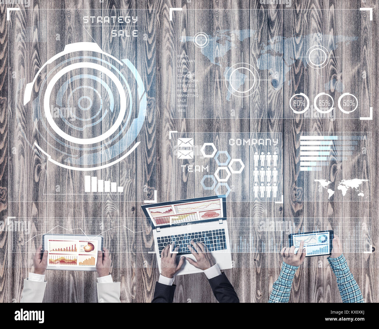 Group of three people with devices in hands working together as symbol ...