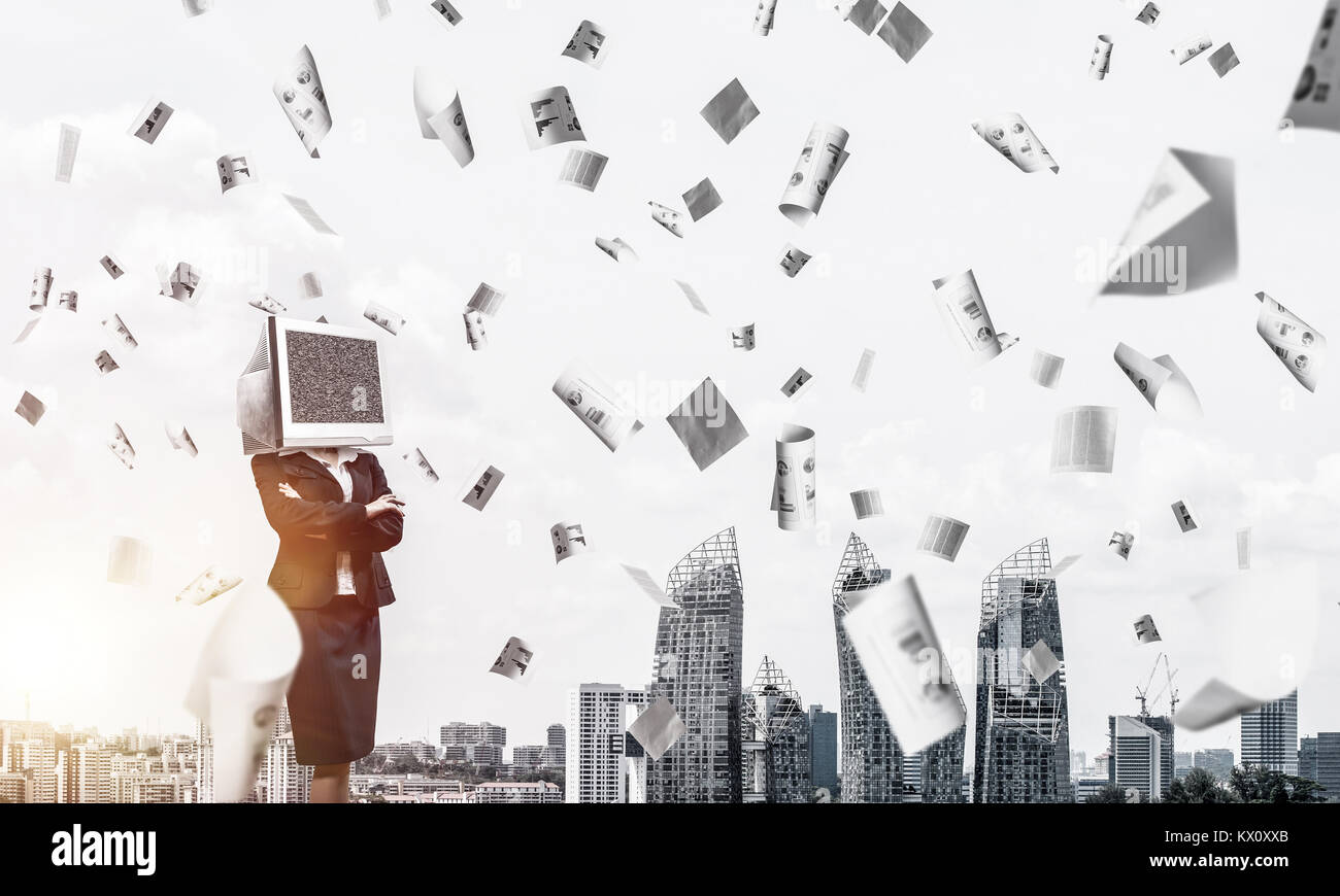 Cropped image of business woman in suit with monitor instead of head ...