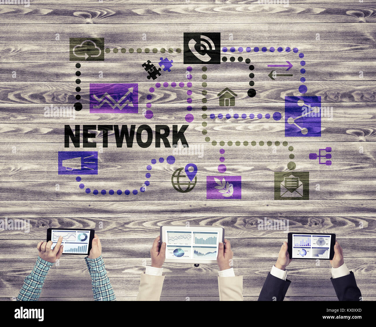 Group of three people with devices in hands working together as symbol ...