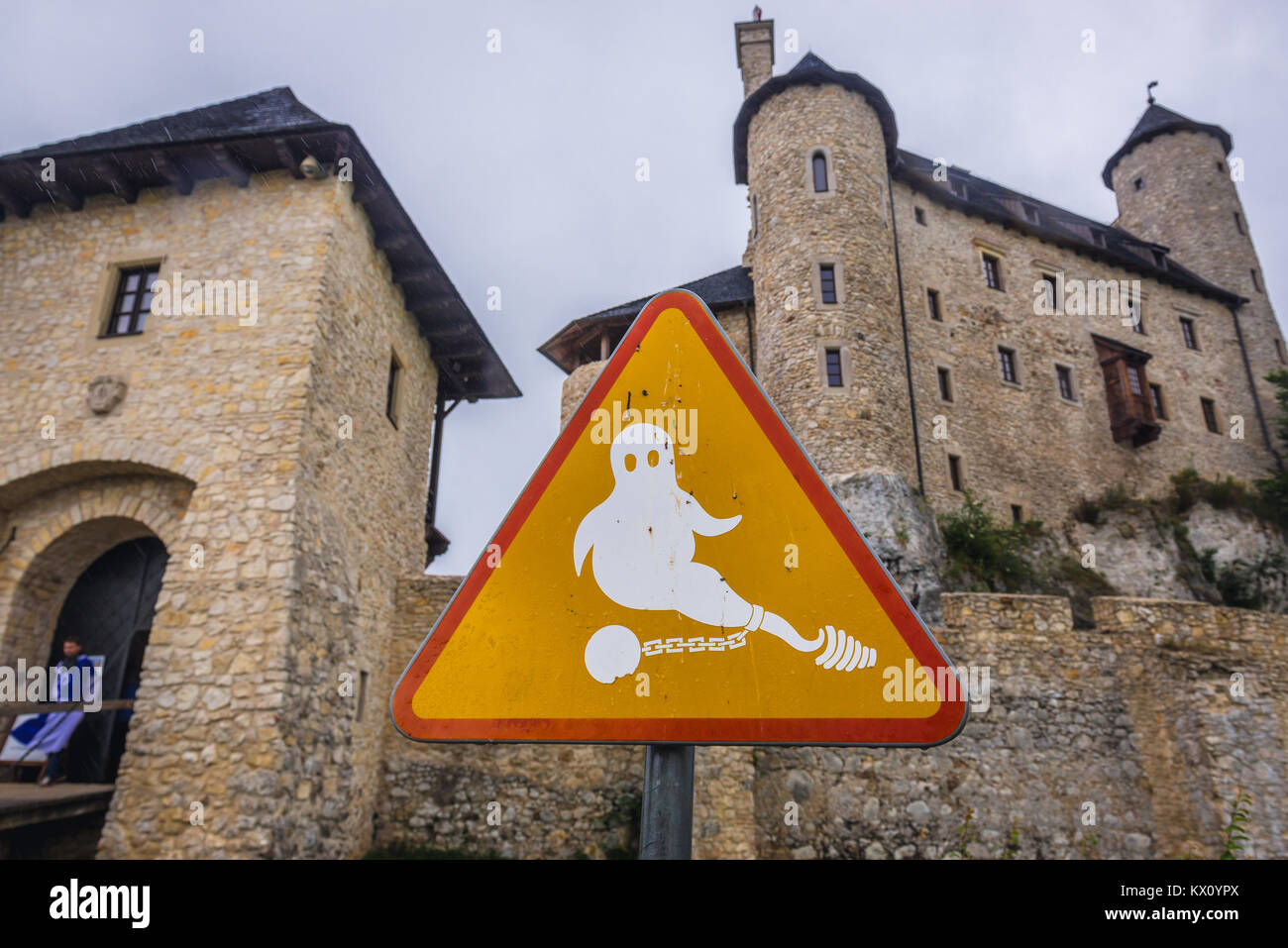 Ghost sign in front of restored 14th century castle in Bobolice village ...