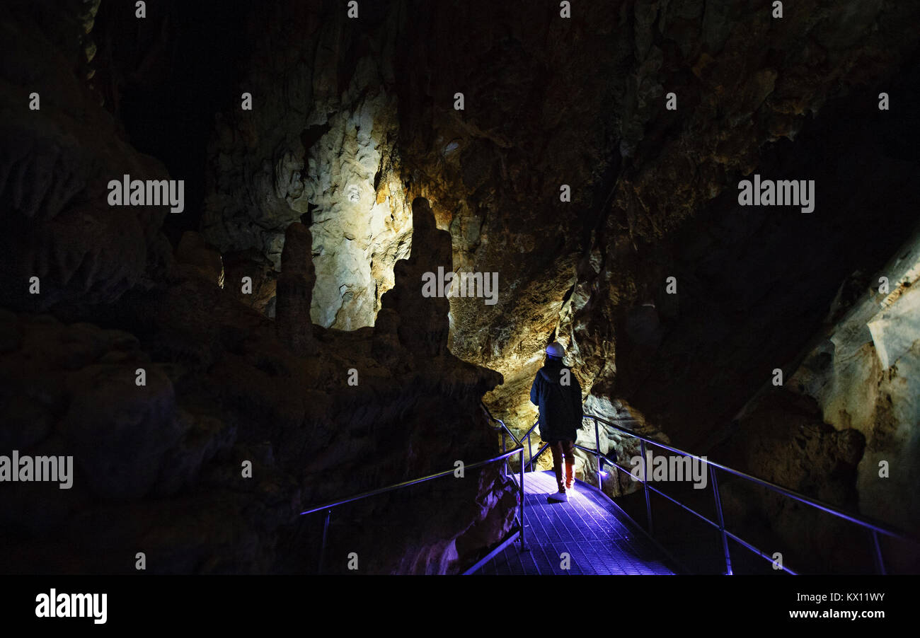 Cave explorer with hard hat Stock Photo - Alamy