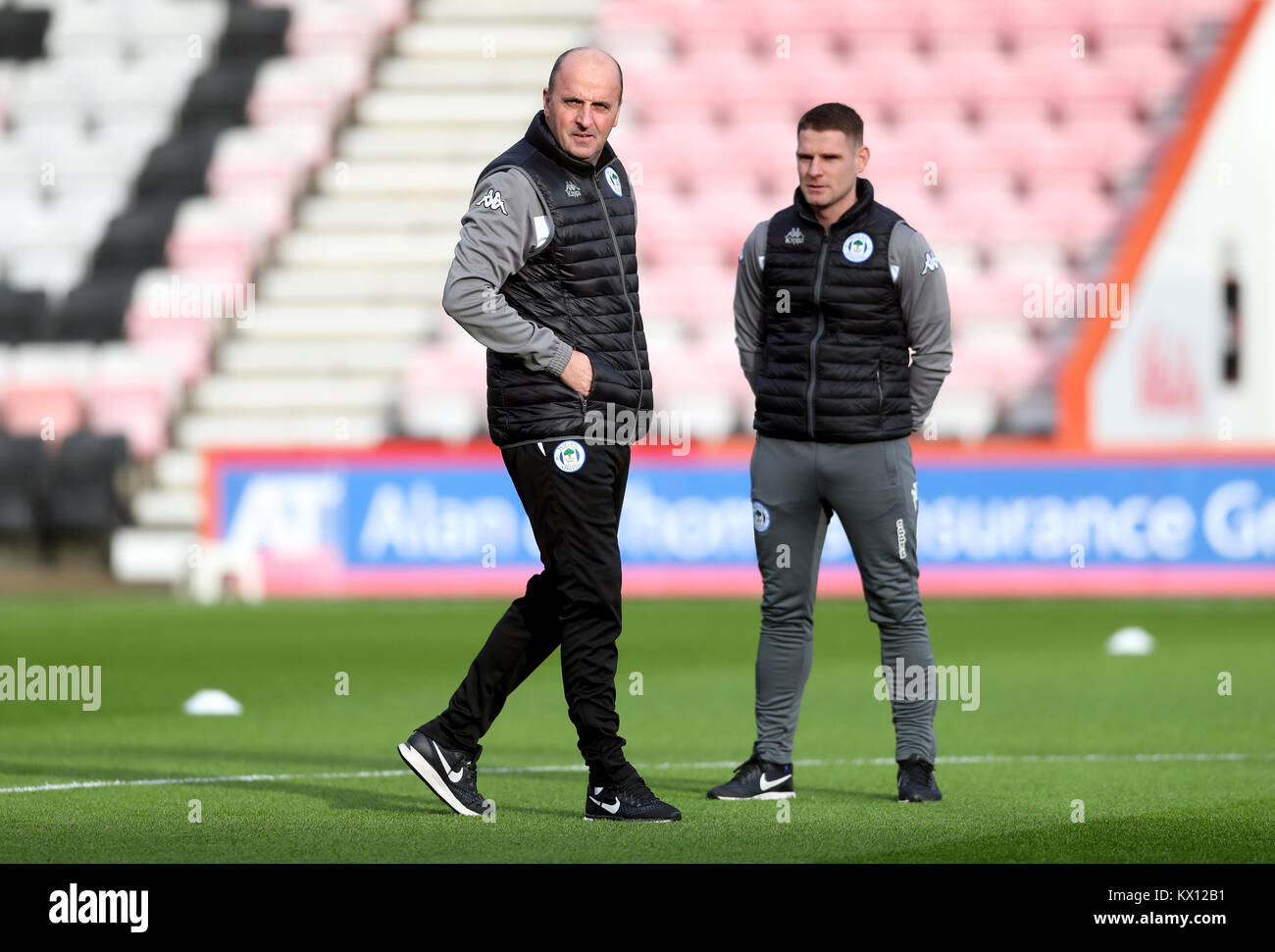 Wigan Athletic manager Paul Cook (left) before the FA Cup, third round ...