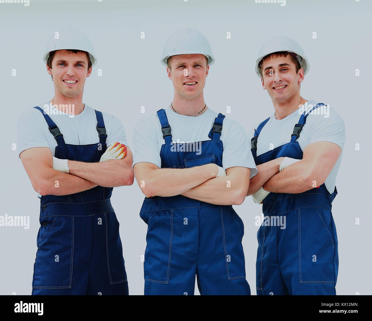 Group of professional industrial workers Stock Photo - Alamy