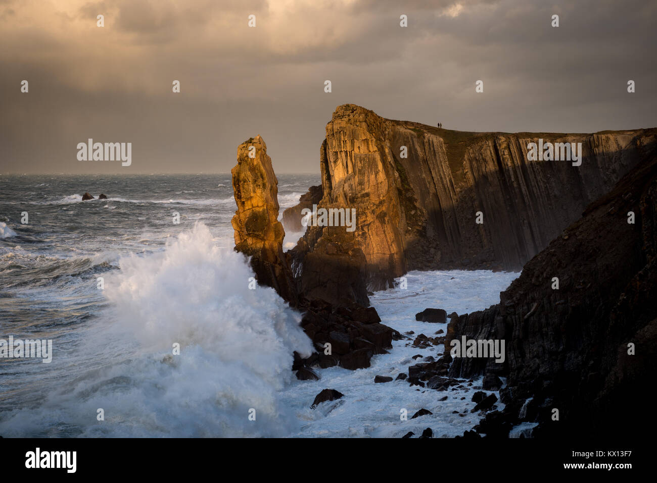 Waves hitting high cliffs Stock Photo - Alamy