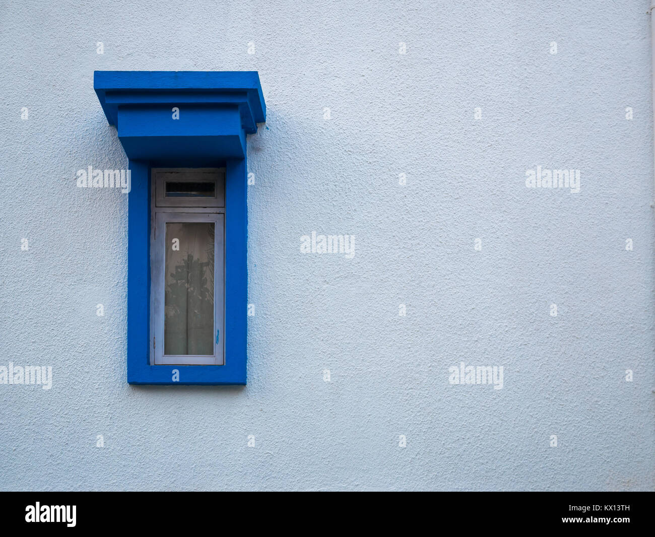 Vintage Blue window on white wall Stock Photo - Alamy