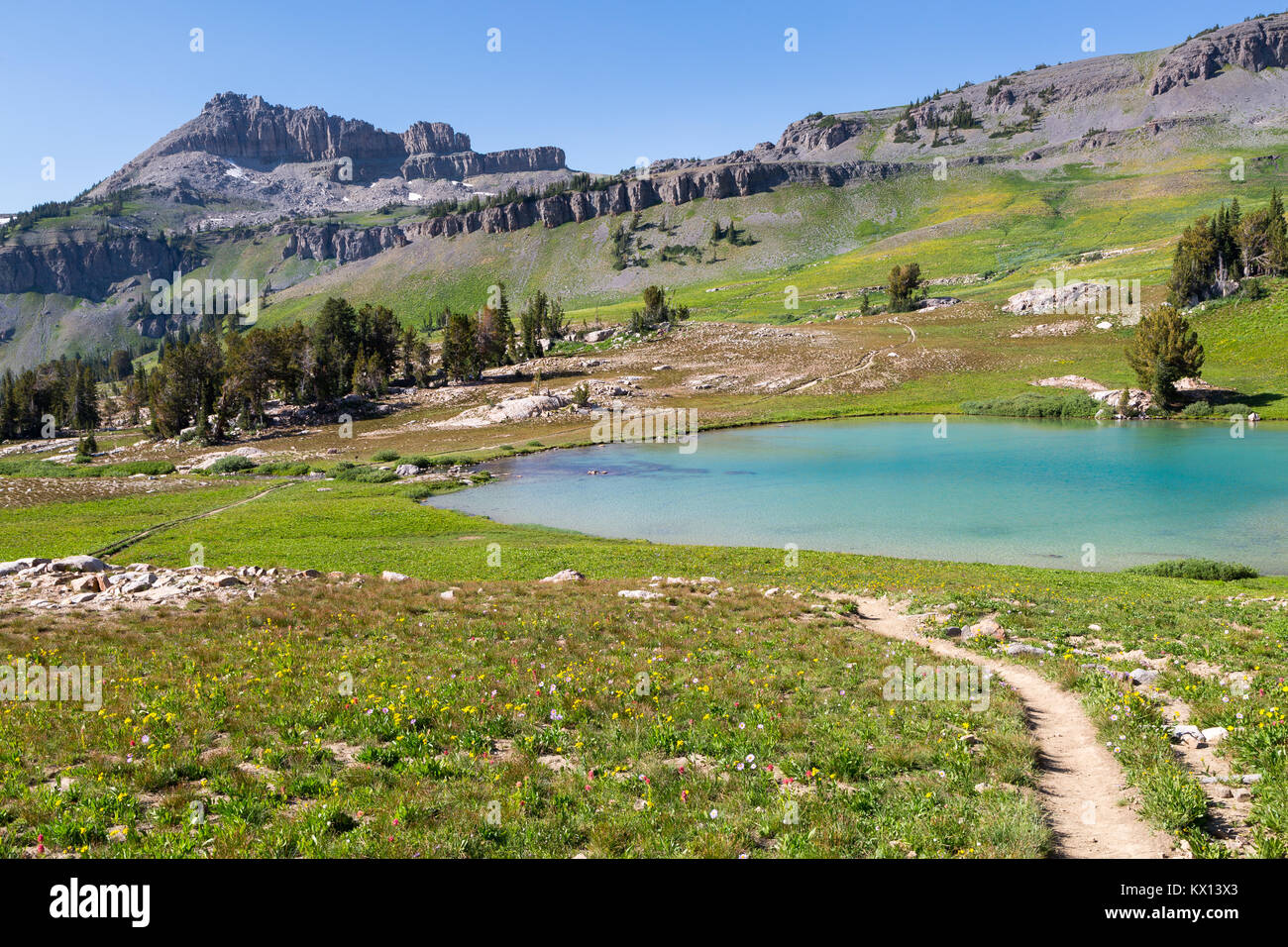 The Teton Crest Trail winding around Sunset Lake above the Alaska Basin ...