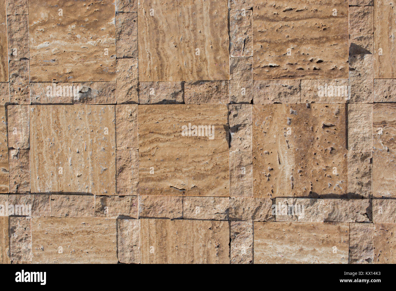 Decorative cubic stone wall as background texture Stock Photo - Alamy