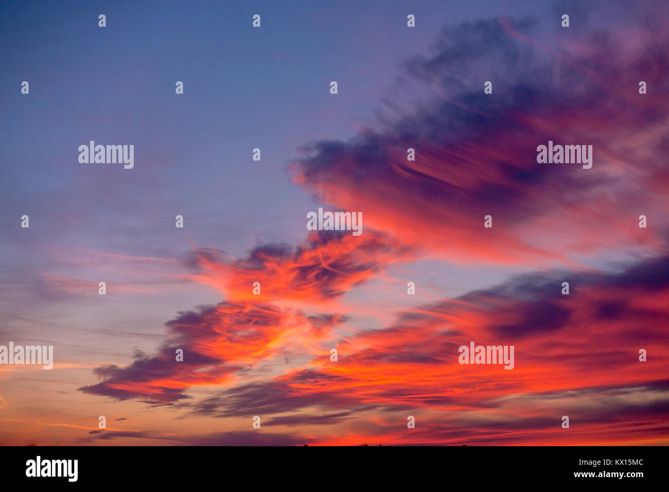 Pink clouds at a sunset Stock Photo - Alamy