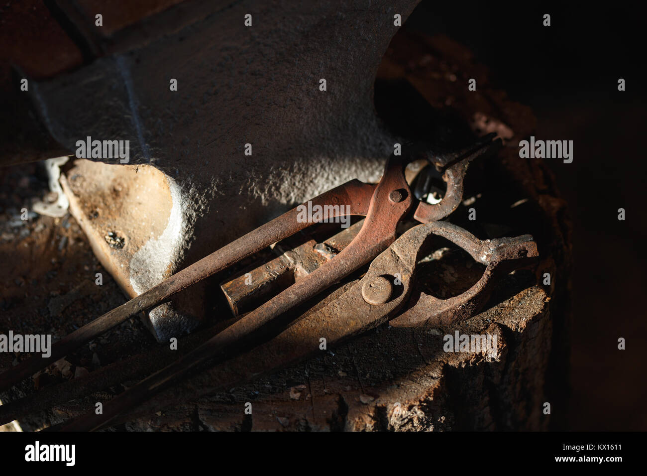 Hand anvil. Tools in old blacksmith shop Stock Photo - Alamy