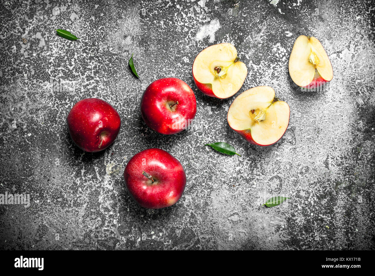 Fresh red apples. On a rustic background Stock Photo - Alamy