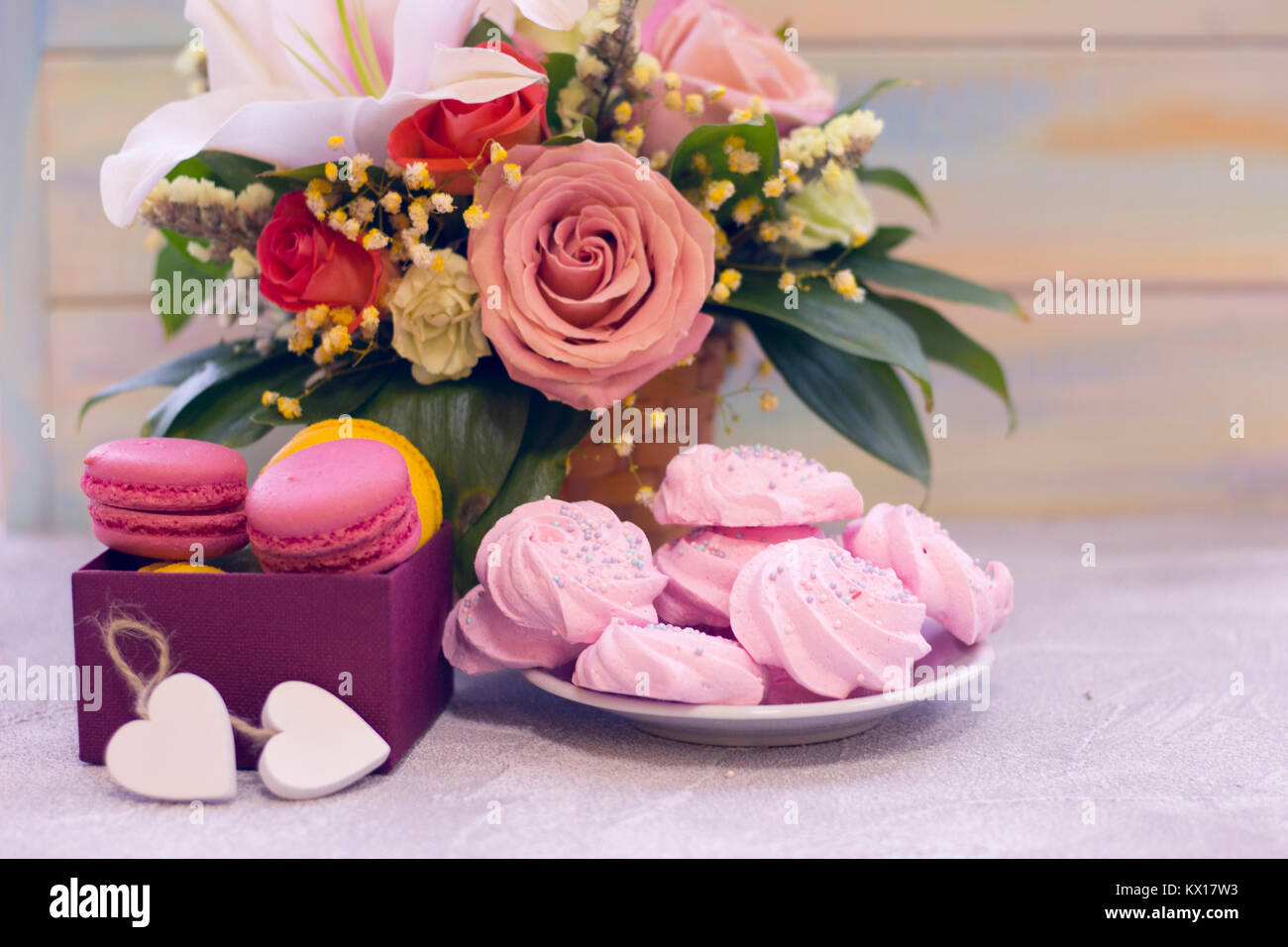Romantic festive compositions with flowers and sweets Stock Photo - Alamy