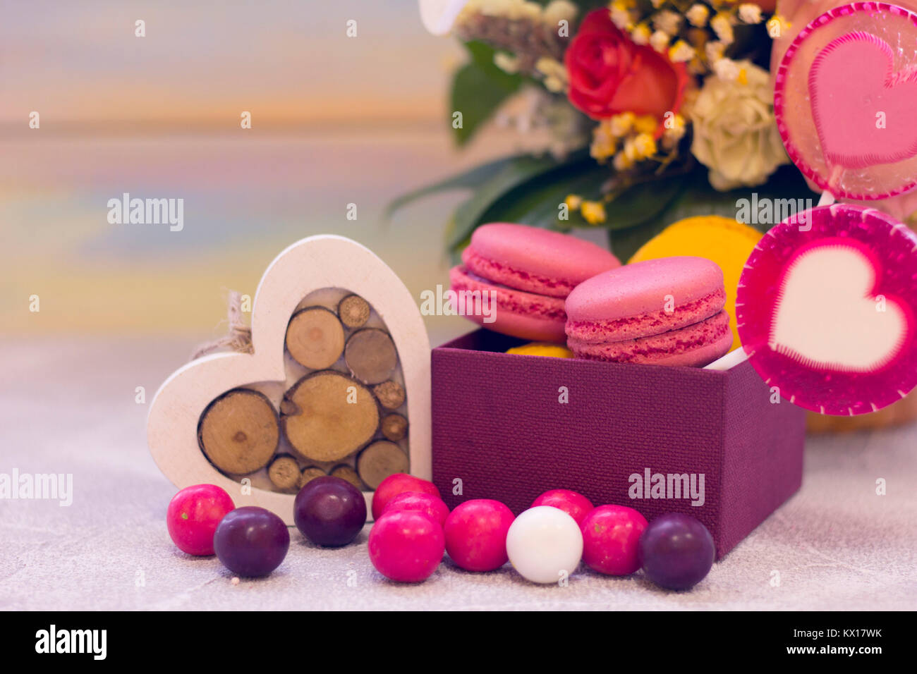 Romantic festive compositions with flowers and sweets Stock Photo - Alamy