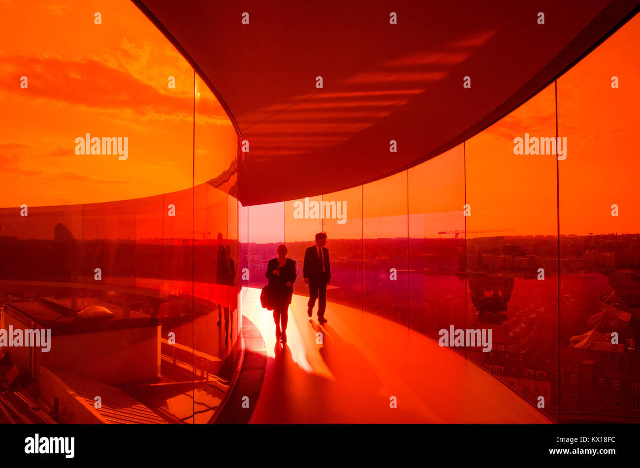 Visitors enjoy Your Rainbow panorama of Aarhus at Aros Art Museum. The ...